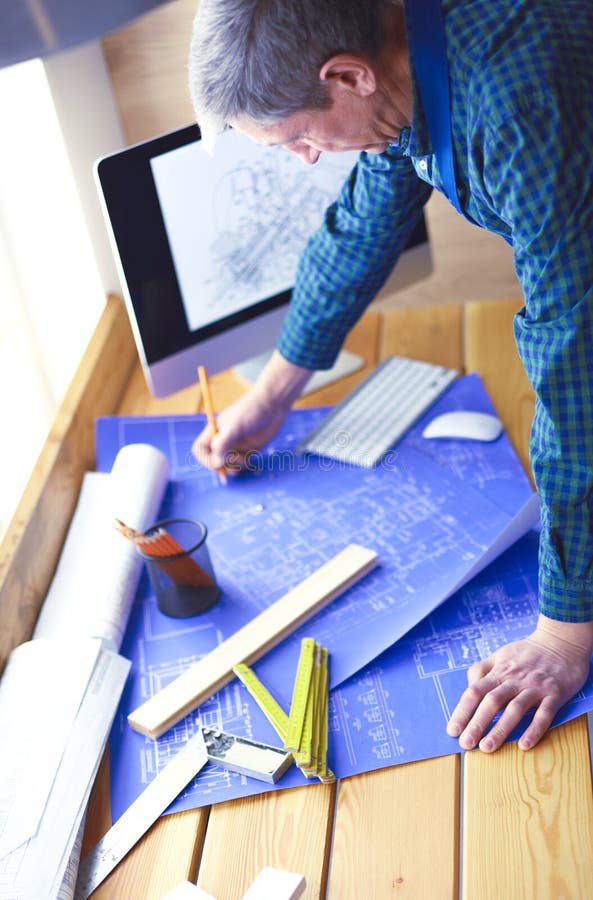 Architect Working on Drawing Table in Office Stock Image - Image of ...
