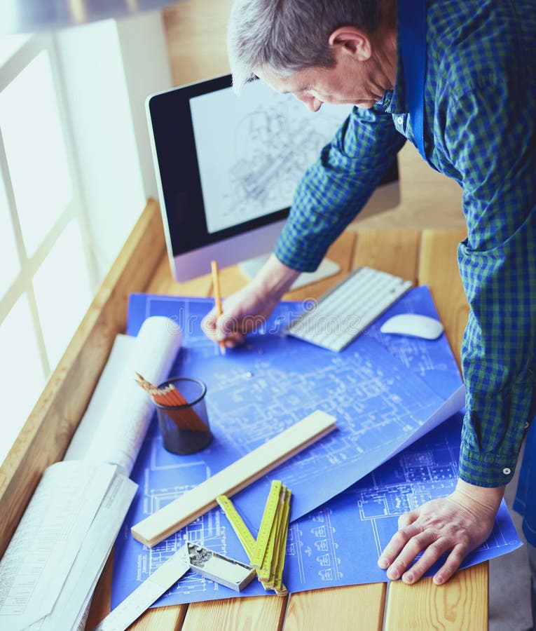 Architect Working on Drawing Table in Office Stock Photo - Image of ...