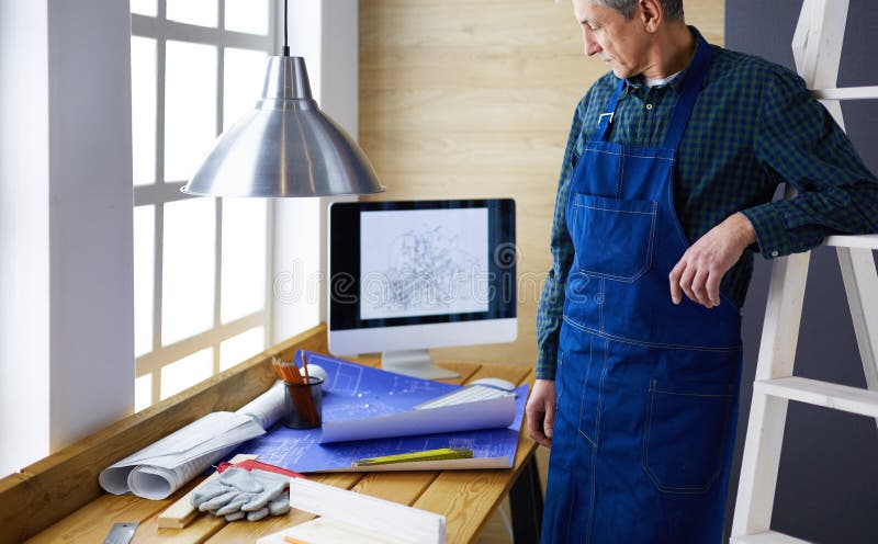 Architect Working on Drawing Table in Office Stock Photo - Image of ...