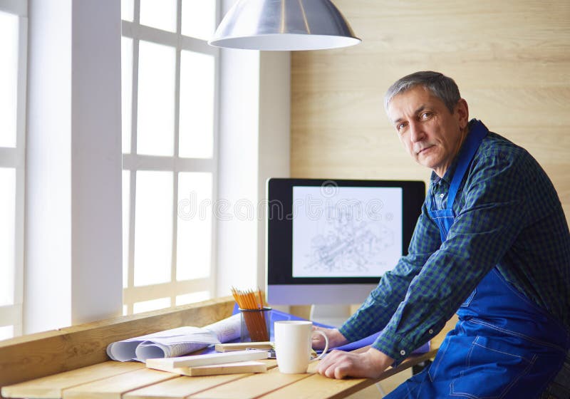 Architect Working on Drawing Table in Office Stock Image - Image of ...