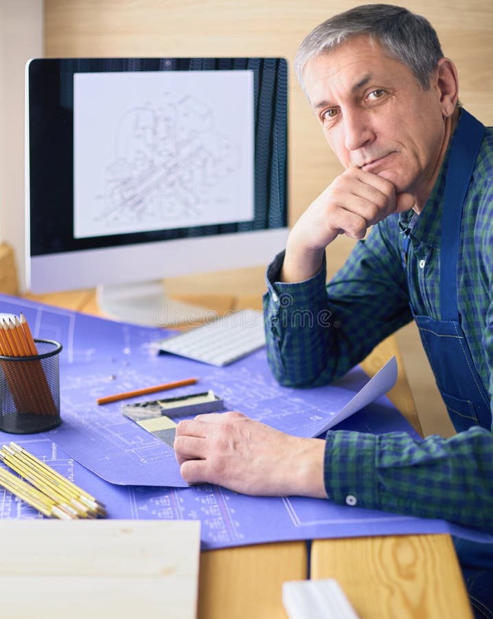 Architect Working on Drawing Table in Office Stock Image - Image of ...