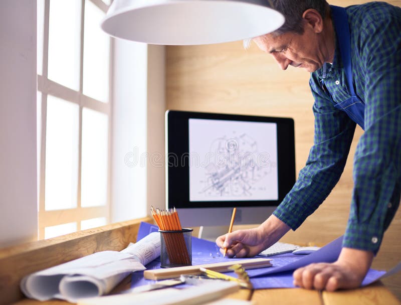 Architect Working on Drawing Table in Office Stock Photo - Image of ...