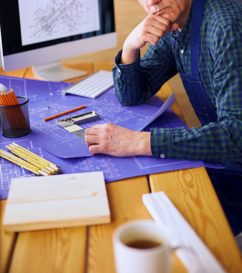 Architect Working on Drawing Table in Office Stock Image - Image of ...