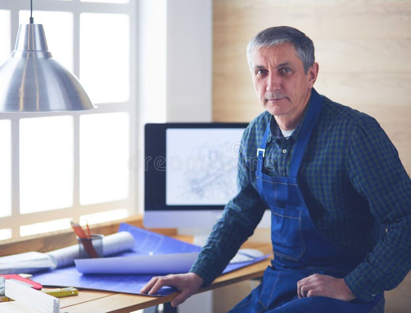 Architect Working on Drawing Table in Office Stock Photo - Image of ...