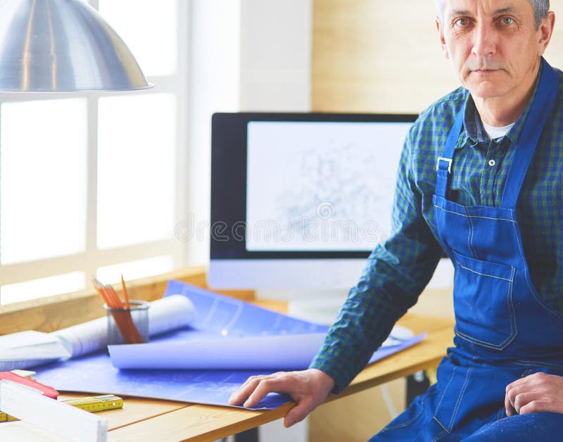 Architect Working on Drawing Table in Office Stock Image - Image of ...