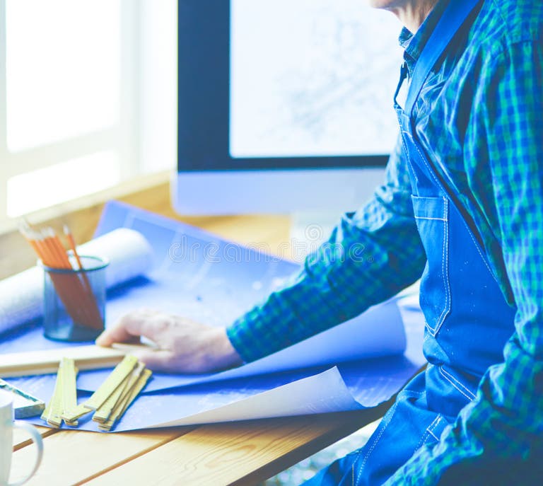Architect Working on Drawing Table in Office Stock Photo - Image of ...