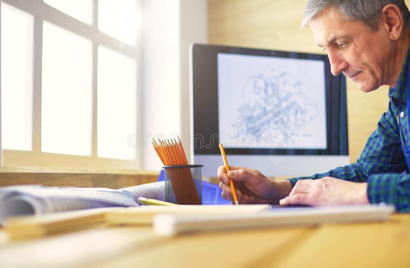 Architect Working on Drawing Table in Office Stock Photo - Image of ...