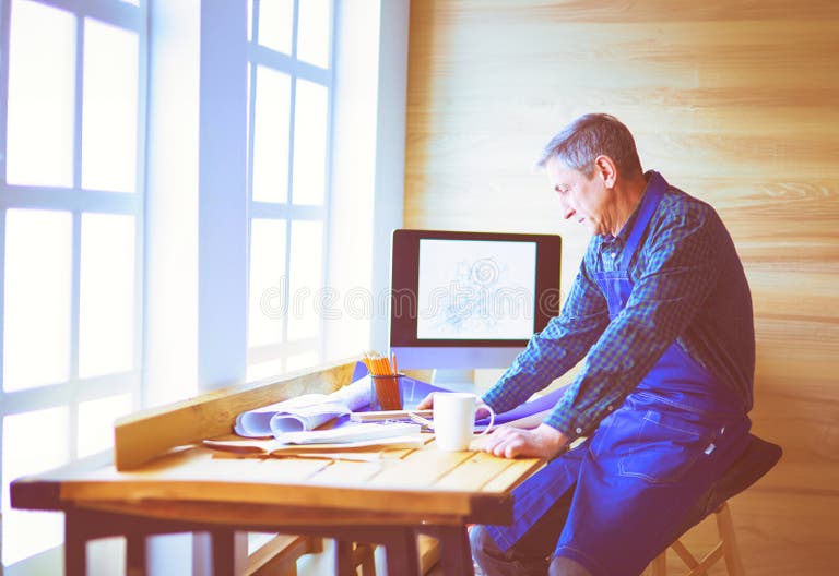 Architect Working on Drawing Table in Office Stock Photo - Image of ...