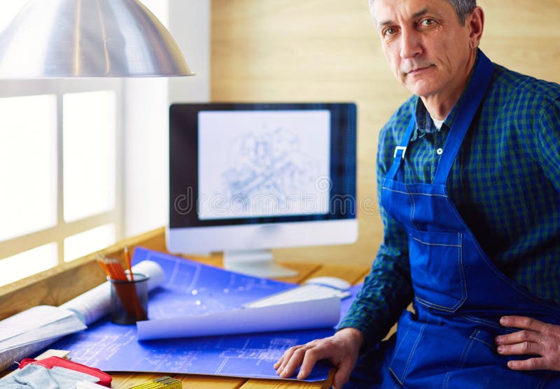 Architect Working on Drawing Table in Office Stock Image - Image of ...