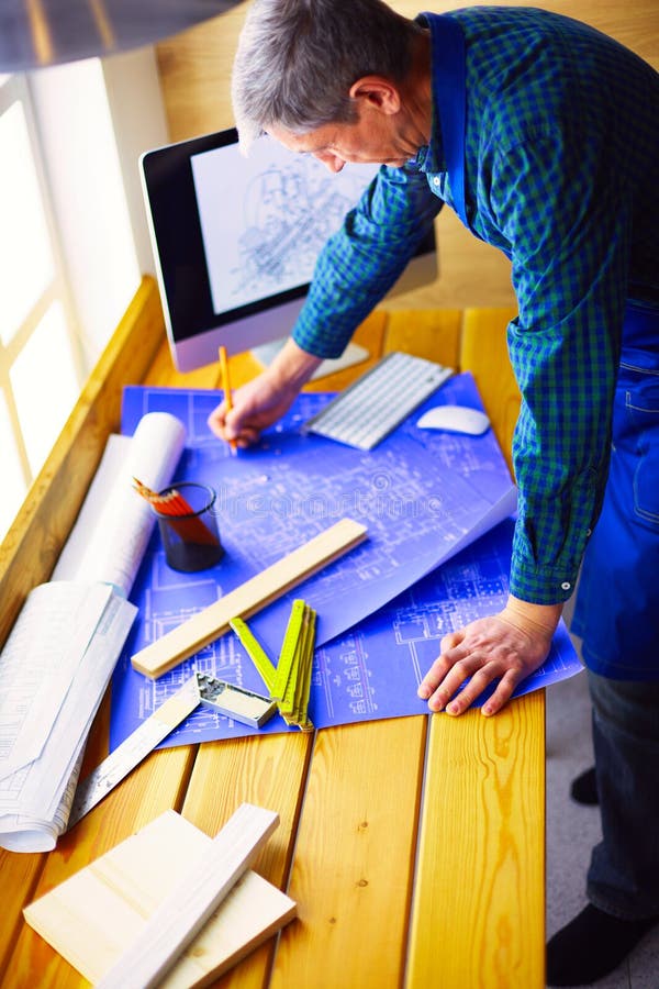 Architect Working on Drawing Table in Office Stock Photo - Image of ...