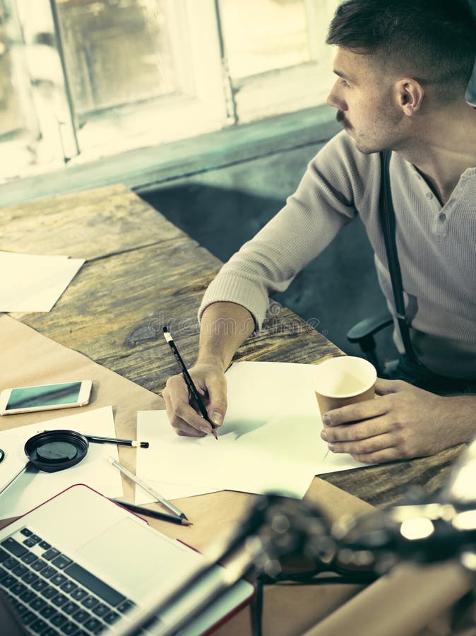 Architect Working on Drawing Table in Office Stock Image - Image of ...