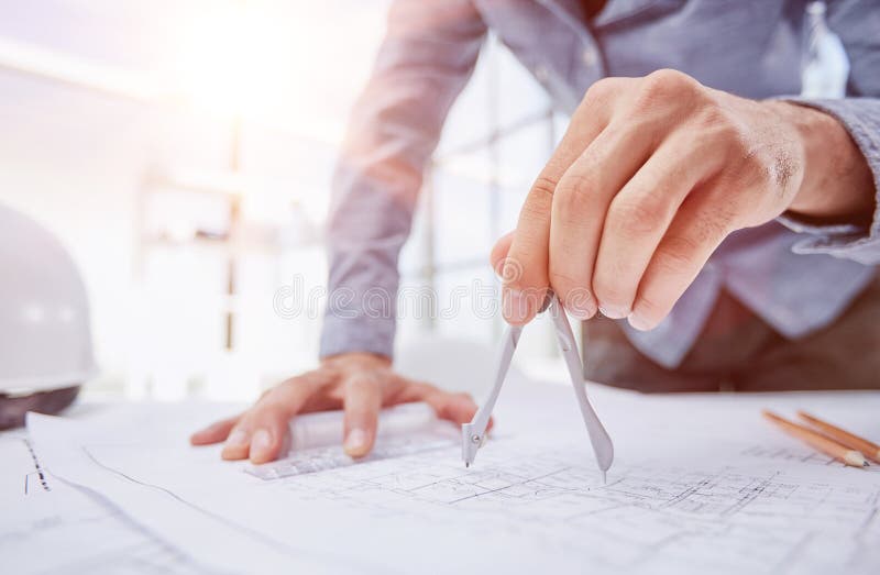 Architect Working on Drawing Table in Office Stock Photo - Image of ...