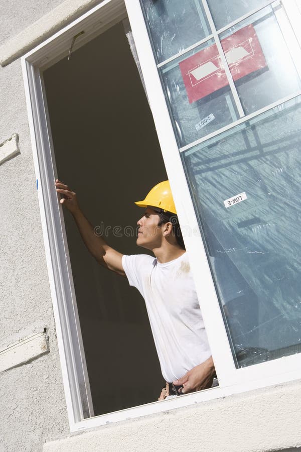 Architect Working Near Window Stock Photo - Image of middle, adult ...