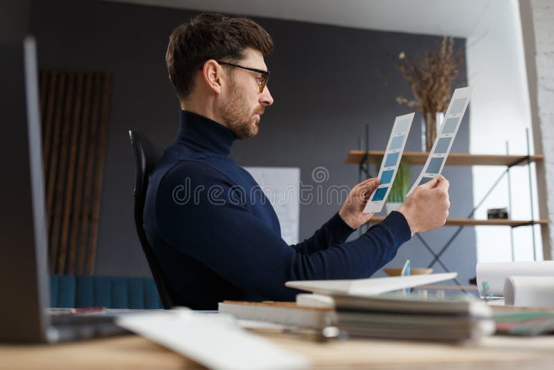 Architect Working in Office with Color Palette. Engineer Select Colors ...