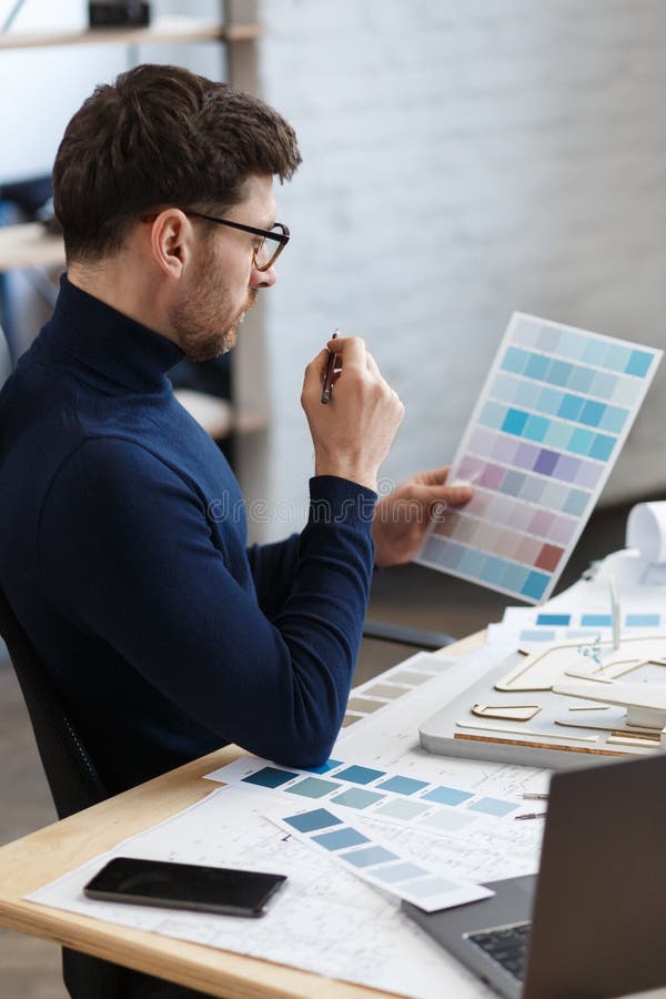 Architect Working in Office with Color Palette. Engineer Select Colors ...