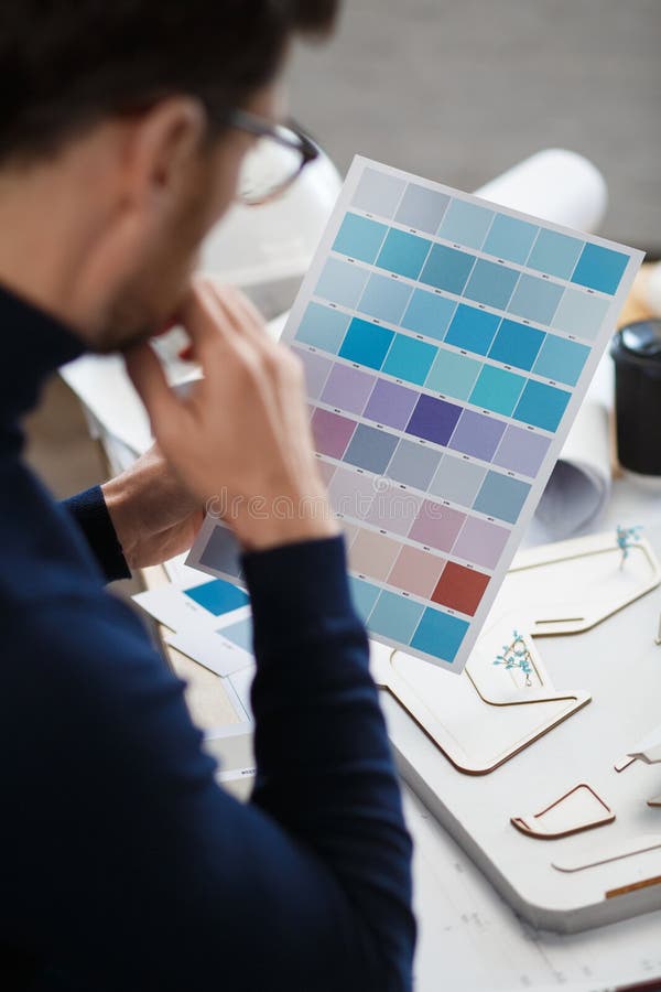 Architect Working in Office with Color Palette. Engineer Select Colors ...