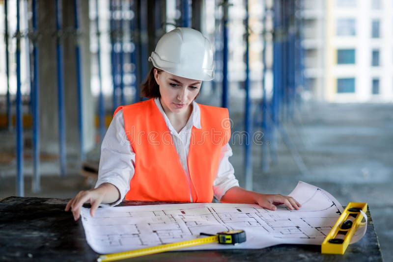 Architect Working Over Plan. Closeup Desk with Blueprints Drawing Stock ...