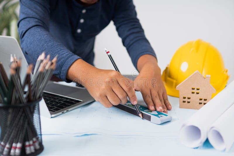 Architect Working and Planning on Blueprint, Engineering Objects on ...