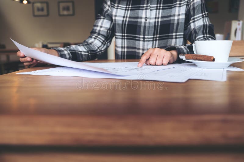 Architect Working and Pointing at Shop Drawing Paper on Table Stock ...