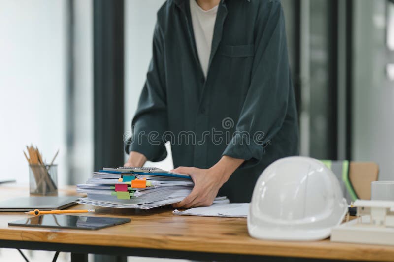 Architect Working Stack of Paper on the Desk, Construction Project ...