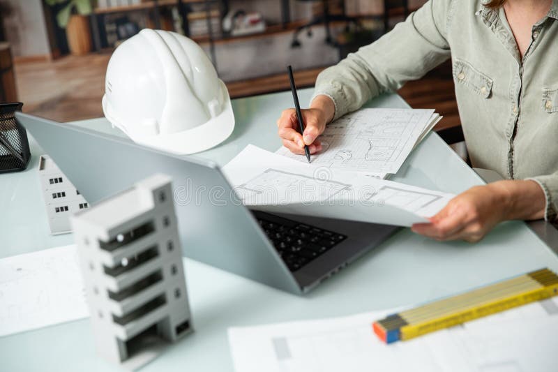 Architect Working on a Technichal Blueprint Project of an Open Space ...