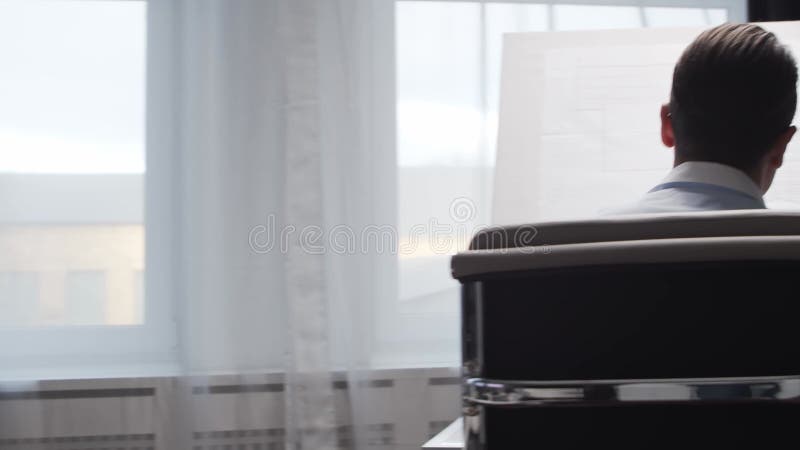 Architect Works in Loft Using Drawing Board. Workplace of Young and ...