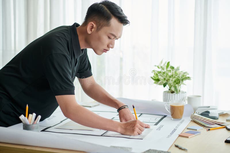 Architect Writing on Blueprint Stock Photo - Image of concentrated ...
