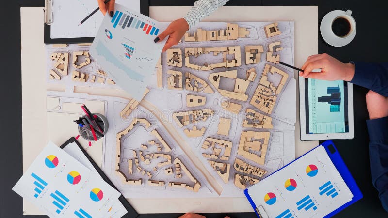 Architects with Buildings Prototype Working at Office Table Stock Photo ...