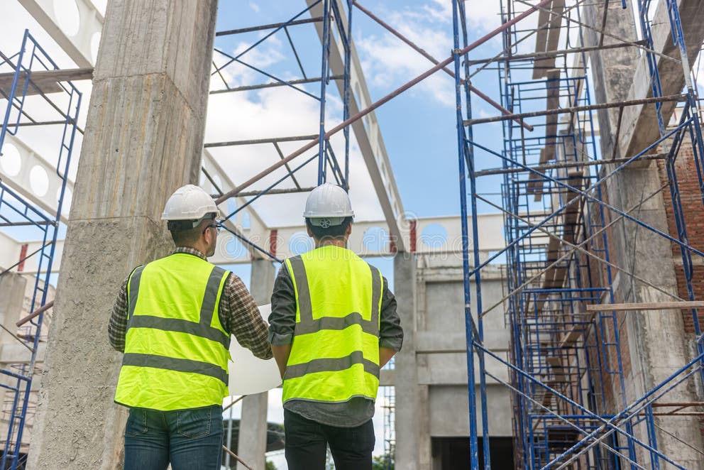 Architects are Checking the Progress of the Building Project and ...