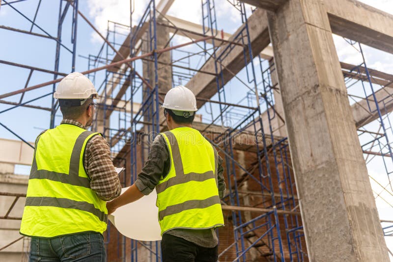 Architects are Checking the Progress of the Building Project and ...