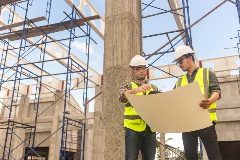 Architects are Checking the Progress of the Building Project and ...