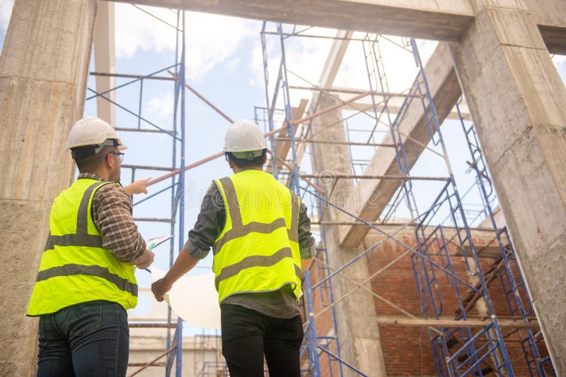 Architects are Checking the Progress of the Building Project and ...