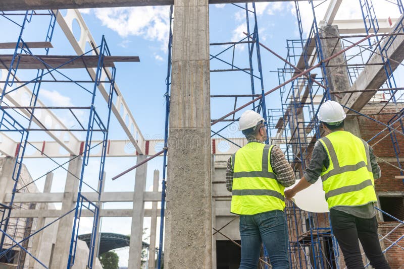 Architects are Checking the Progress of the Building Project and ...