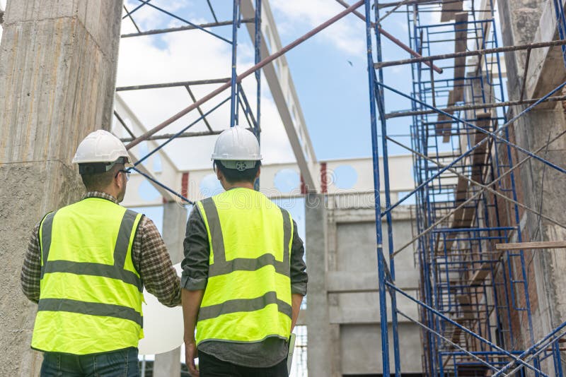 Architects are Checking the Progress of the Building Project and ...