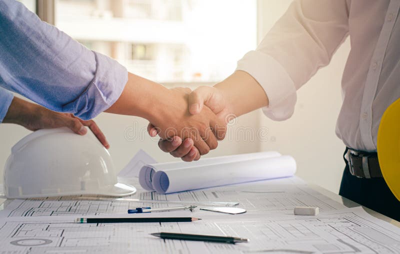 Architects and Chief Construction Engineers Work Together As a Team and ...