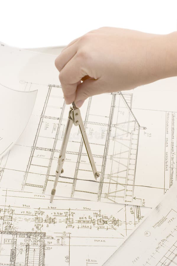 Architects compass in hand stock image. Image of construction - 12866735