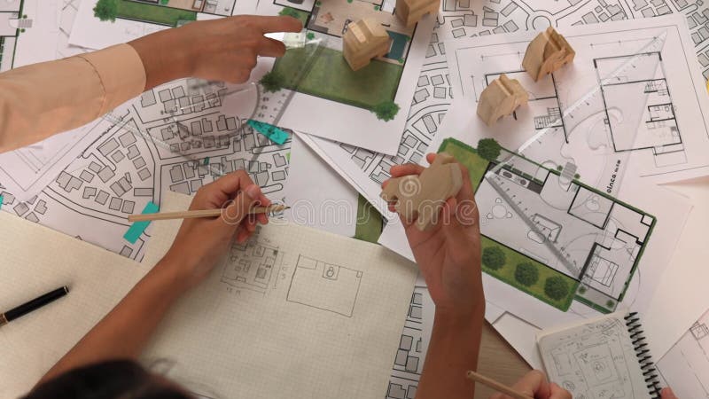 Architects Consider about House Construction Design with Blueprint ...