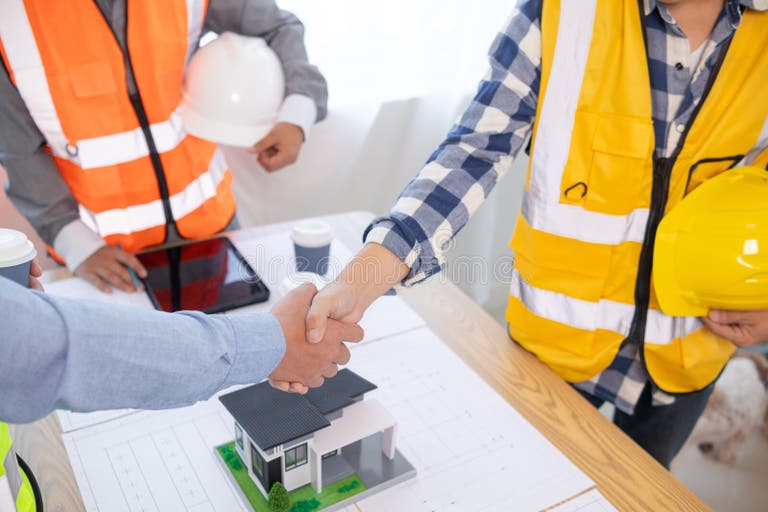 Architects and Construction Engineering Handshake after Meeting Discuss ...