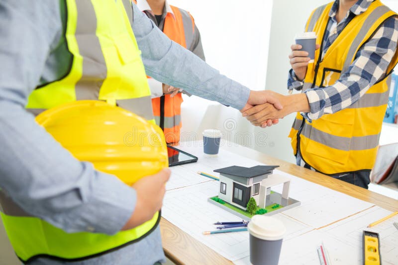 Architects and Construction Engineering Handshake after Meeting Discuss ...