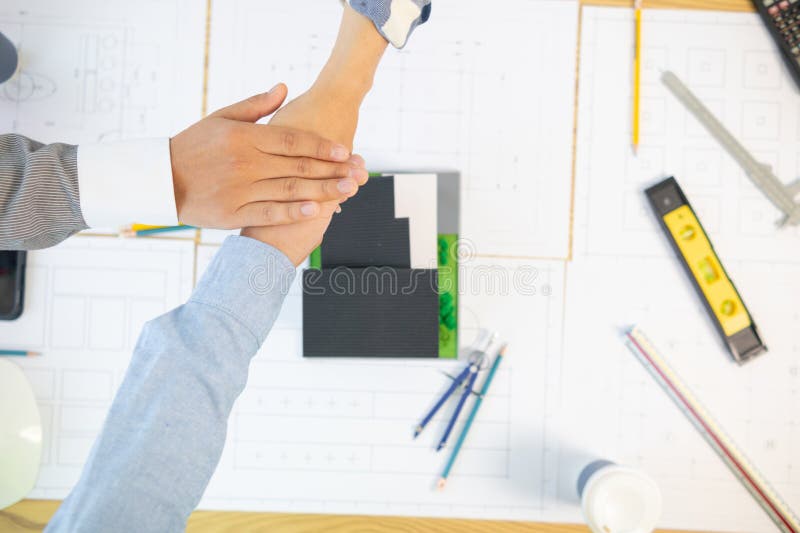 Architects and Construction Engineering Handshake after Meeting Discuss ...