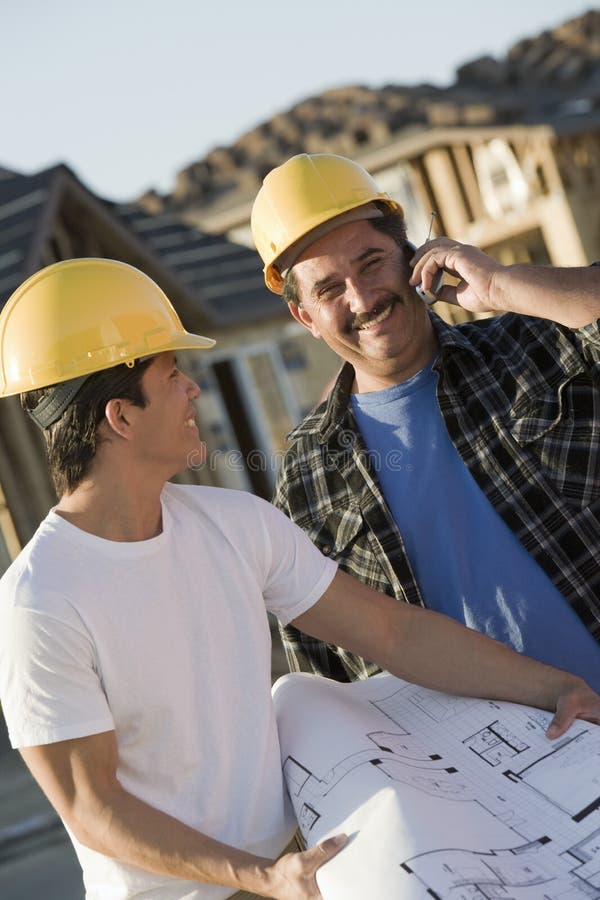 Architects at Construction Site Stock Photo - Image of focus, blueprint ...