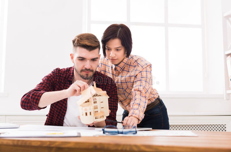 Architects Creating House Model in Office Stock Image - Image of group ...