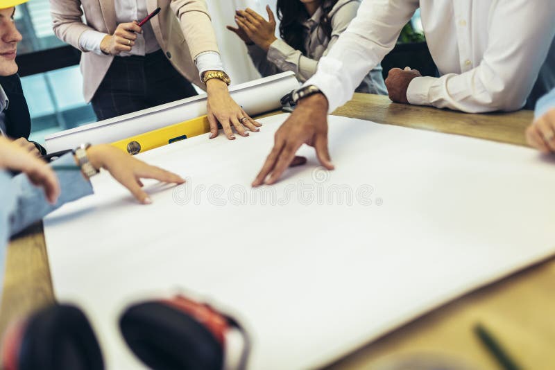 Architects, Designers and Engineers Having Working Meeting in the ...