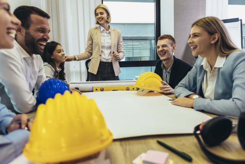 Architects, Designers and Engineers Having Working Meeting in Modern ...