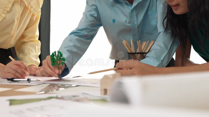 Architects Discuss Tree Position of House Construction Blueprint ...