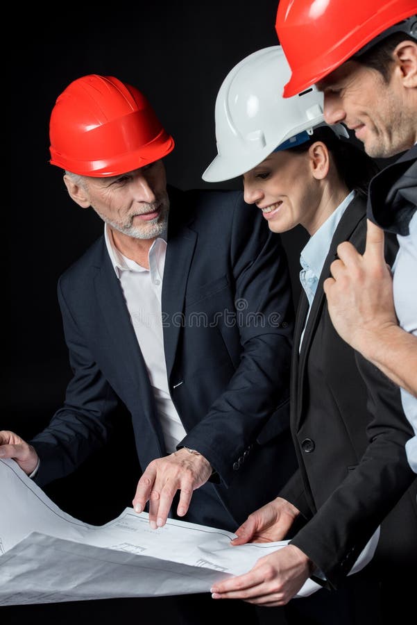 Architects Discussing Blueprint Stock Image - Image of business ...