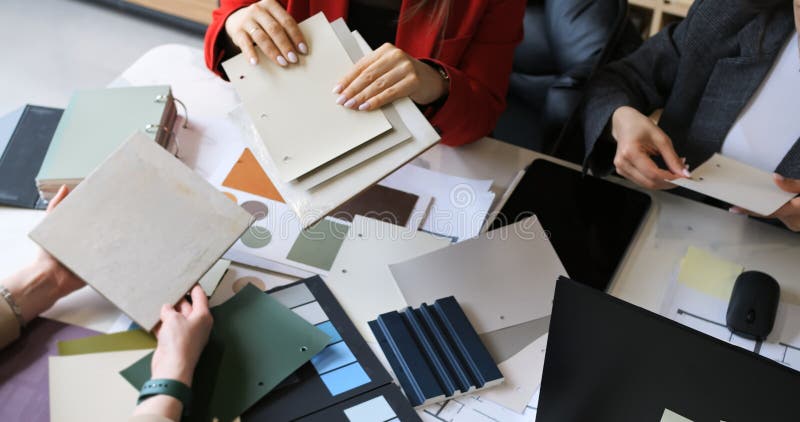 Architects Discussing New Project Layouts in Collaborative Meeting ...