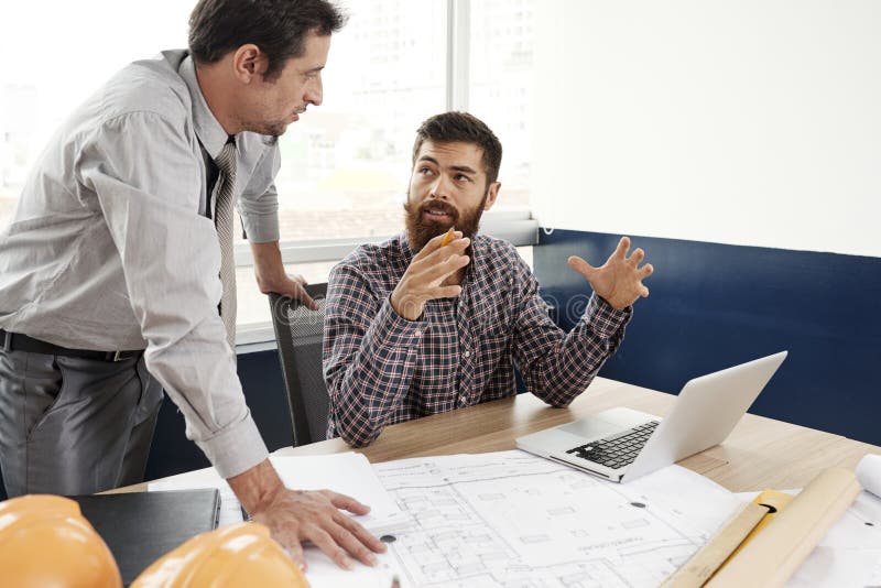 Architects Discussing New Project Stock Photo - Image of table, project ...