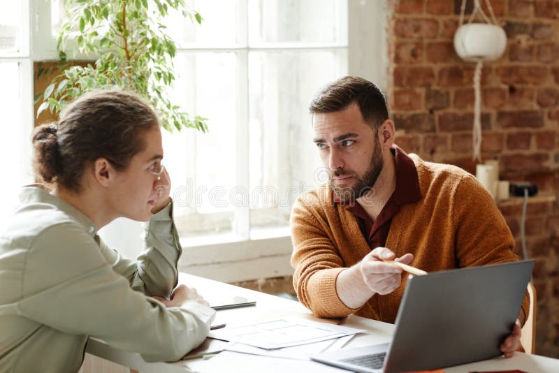 Architects Discussing Project Stock Image - Image of smiling ...