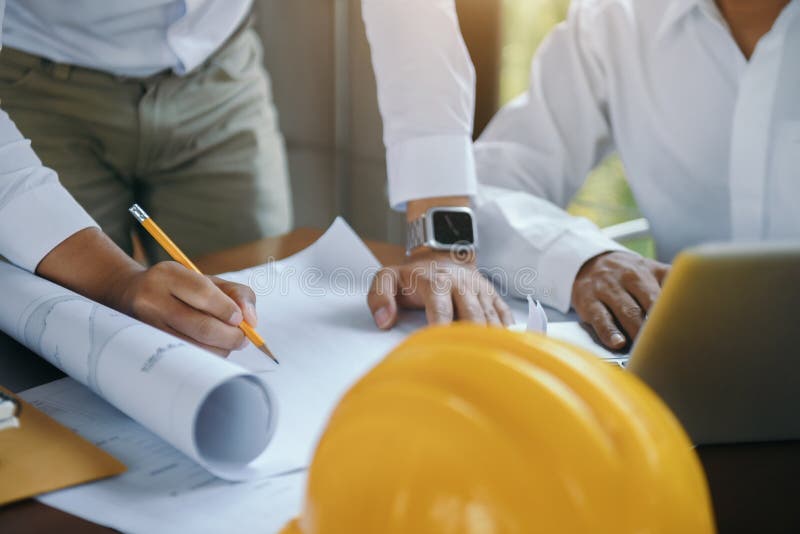 Architects Discussing at the Table. Stock Image - Image of drawing ...